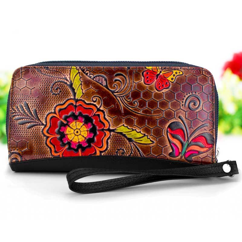 Ladies wallets with zipper closure, leather embossed by artisans